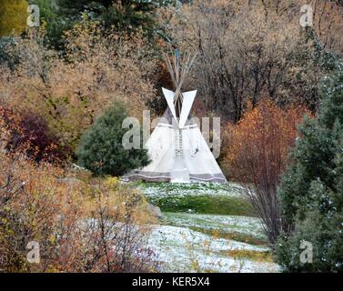 Native American Indian tipi with smoke from a campfire Stock Photo - Alamy