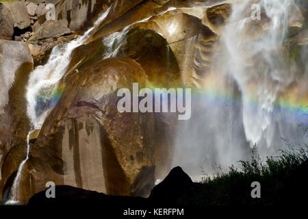 Waterfall known as Vernal Fall falling on a smooth wall of granite in ...