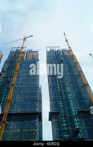Shenzhen, China: residential buildings under blue sky and white clouds ...