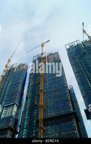 Shenzhen, China: residential buildings under blue sky and white clouds ...