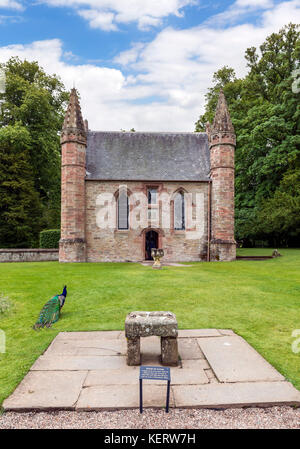 The chapel on Moot Hill with a replica of the stone of Scone in front ...