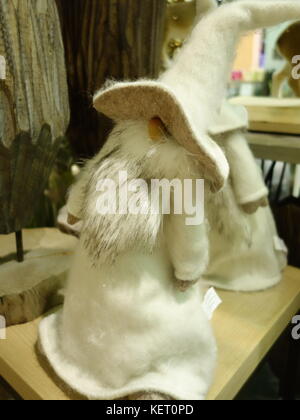 Small penguin Christmas tree decoration on an icy background. Studio ...