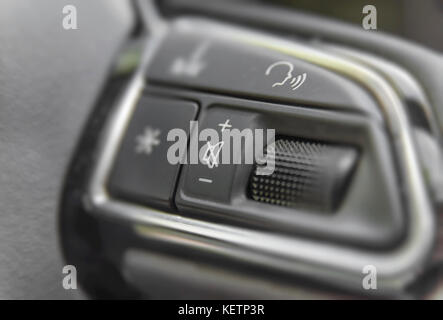 Steering wheel commands in modern luxurious car Stock Photo - Alamy