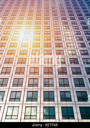 Modern office building with sun ray reflection from corner Stock Photo ...