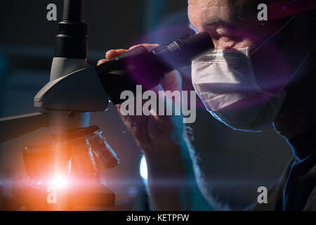 Doctor examines patient tissue samples Stock Photo - Alamy