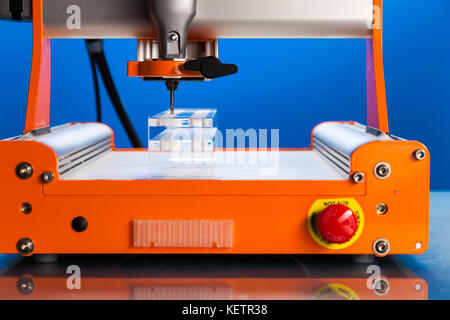 The milling machine processes the plastic blank Stock Photo - Alamy