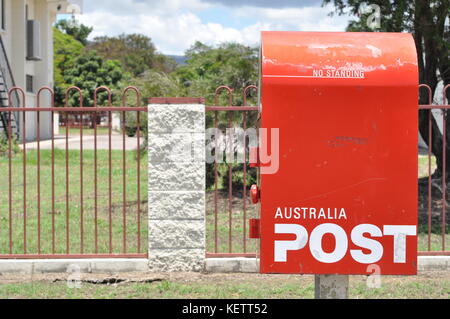 Red Australia Post mail box close up on a suburban Melbourne street ...