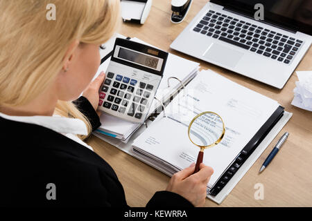 Businesswoman Investigation Finance Using Magnifying Glass. Fraud And ...