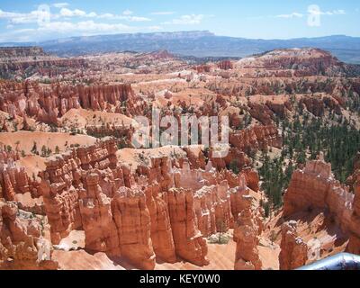 Deep Canyon Landscape with Distant Rock Towers and Vibrant Red Hues ...