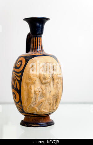 Ancient squat lekythos with relief decoration showing Neoptolemos ...