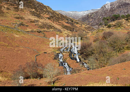 Waterfalls on Afon (River) Cwm Llan and an old slate quarry building ...