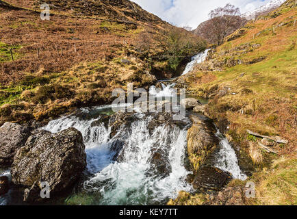 Waterfalls on Afon (River) Cwm Llan and an old slate quarry building ...