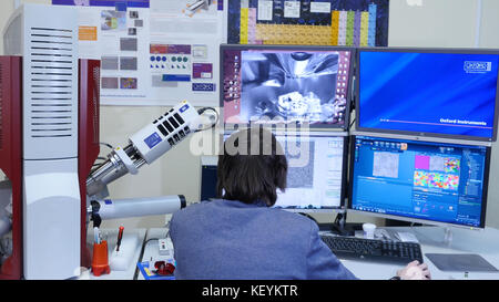 Programmer configures the computer for bitcoin mining. Programmers are ...