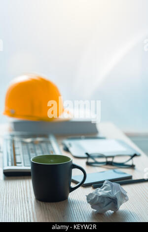 Architecture project failure, crumpled blueprint sketch paper on office ...