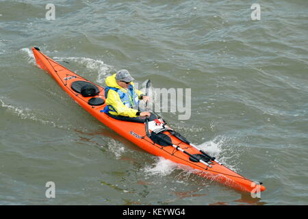 Paddling a full equipped sea kayak viewed from above Stock Photo - Alamy
