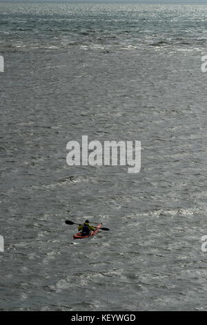 Paddling a full equipped sea kayak viewed from above Stock Photo - Alamy