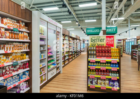 Vitamin and herbal supplement display shelves in a health food store ...