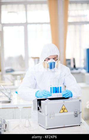 scientist working with test tube. researcher doing research ...