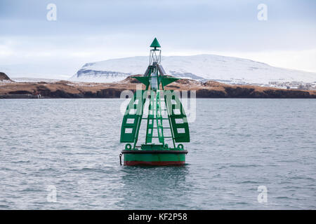 Green framed buoy with cone topmark. Navigation equipment of Reykjavik ...