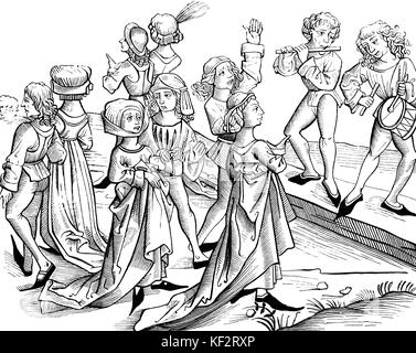 Medieval dancers and musicians playing pipe & tabor on Christmas night ...