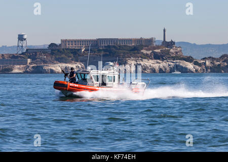 A Coast Guard MSST in a Defender-class boat, aka Response Boat – Small ...
