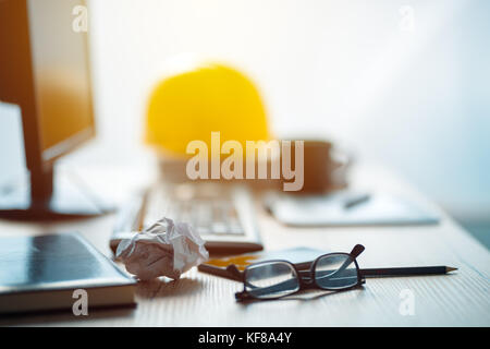 Architecture project failure, crumpled blueprint sketch paper on office ...