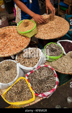 Baskets of dried fish and shrimp for sale on the street in the ancient ...