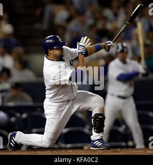 Los Angeles Dodgers' Jason Repko is hit in the elbow by a pitch by ...