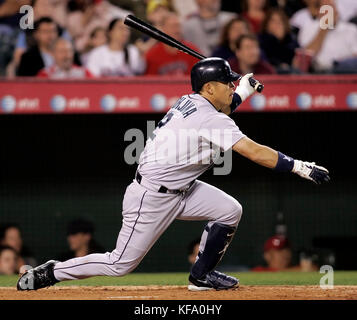 Seattle Mariners third baseman Chone Figgins awaits the throw as ...