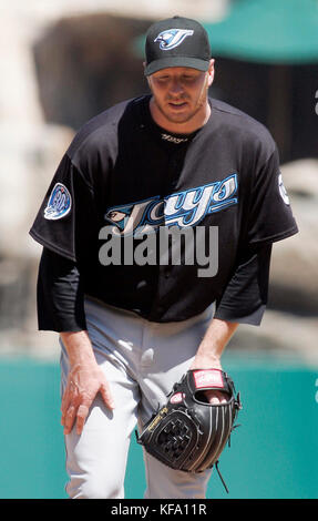 Toronto Blue Jays pitcher Roy Halladay looks on after giving up a solo ...