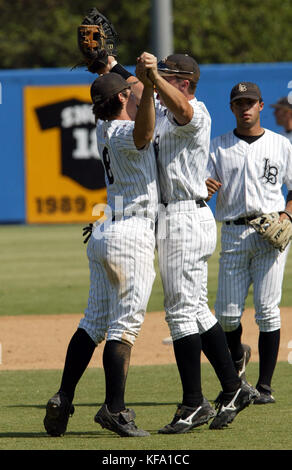 Long Beach State's Adam Heether, second from right, and Mike Hofius ...