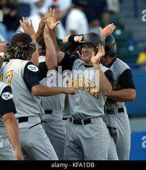 Long Beach State's Adam Heether, left, celebrates with his teammate ...