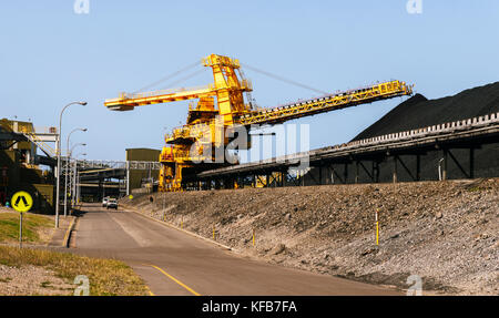 a huge coal loading conveyor belt piles coal. Kooragang Island ...