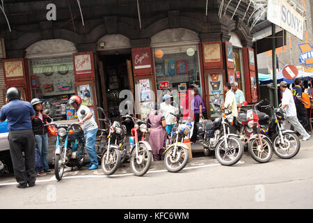 Mauritius, Port Louis. People walking the Esplanade on the waterfront ...