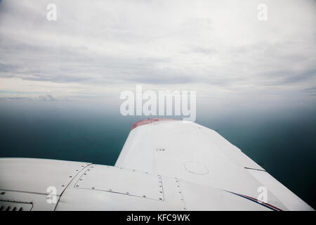 The wing and the clouds over Bahamas Stock Photo - Alamy