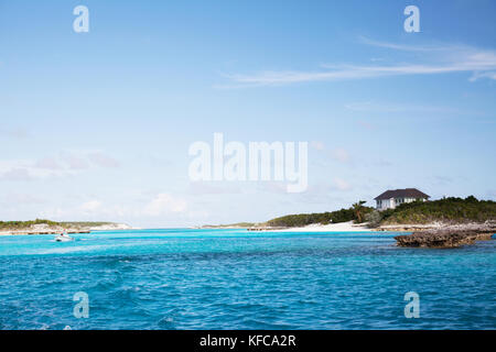 EXUMA, Bahamas. A view of the water and a house at Musha Cay Stock ...
