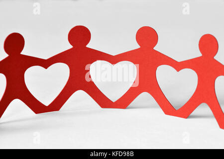 Paper chain people Stock Photo - Alamy