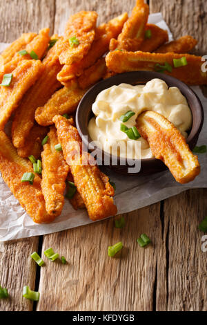 Crispy deep fried baby corn with sauce close-up on the table ...