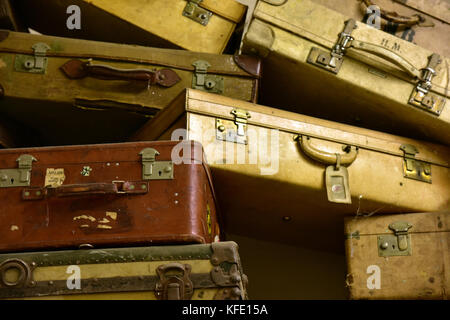 Old fashioned luggage piled up in 1940s style train station Stock Photo ...