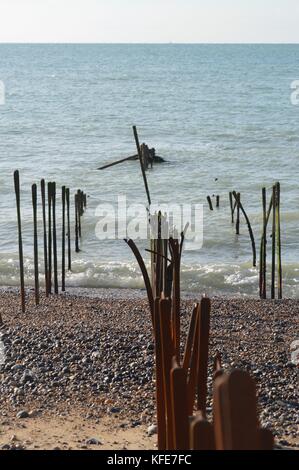 Weathered metal sea defence on South Coast beach in England Stock Photo ...