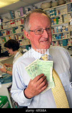 Pharmacy dispenser Chris Badham Stock Photo - Alamy