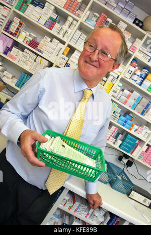 Pharmacy dispenser Chris Badham Stock Photo - Alamy