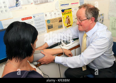 Pharmacy dispenser Chris Badham Stock Photo - Alamy