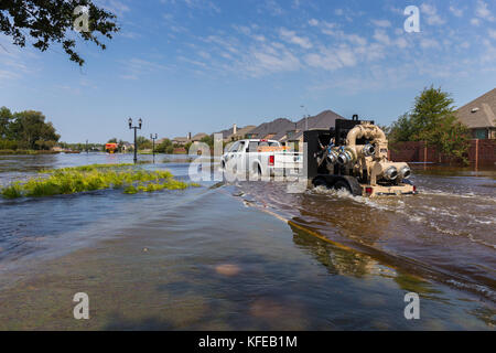 Mobile flood pumps are brought to the Riverstone neighborhood for ...