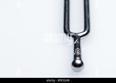 Closeup of a tuning fork 440 Hz on a white background Stock Photo - Alamy
