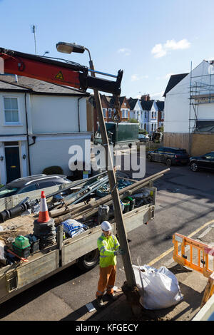 Removal of old sodium lamp / street lamppost. The concrete post is at ...