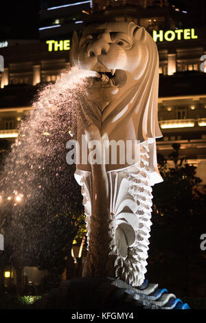 Merlion fountain with statue of half lion and fish, that has become a ...
