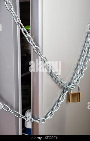 Close-up Of Refrigerator Locked With Chain And Padlock Stock Photo - Alamy