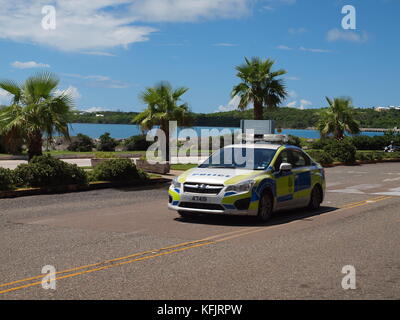 Bermuda Police Service car on patrol in a local setting with the ...