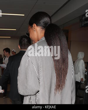 Kelly Rowland smiles for the camera at Los Angeles International ...